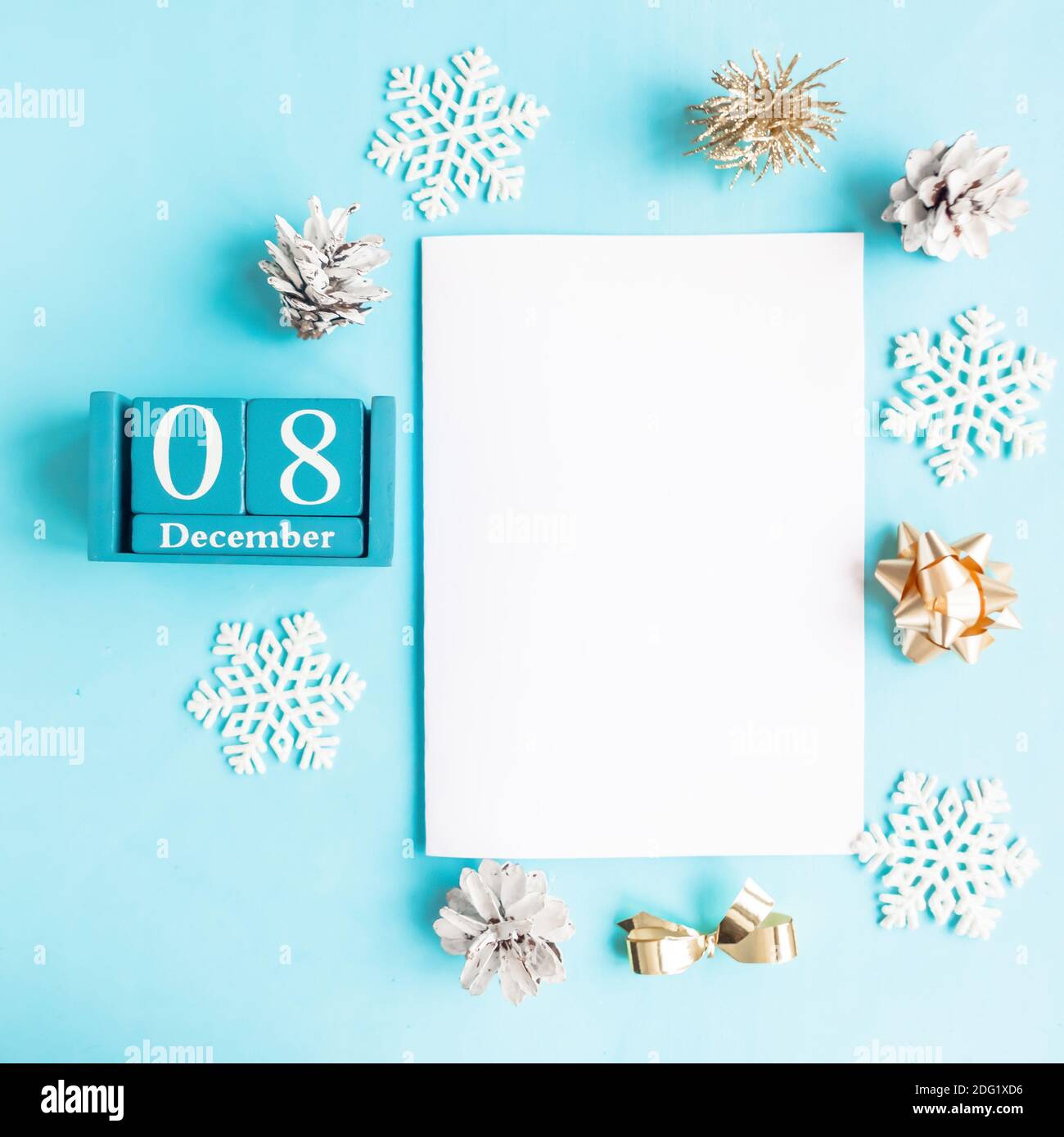 December 8. Blue cube calendar with month and date and white mockup ...