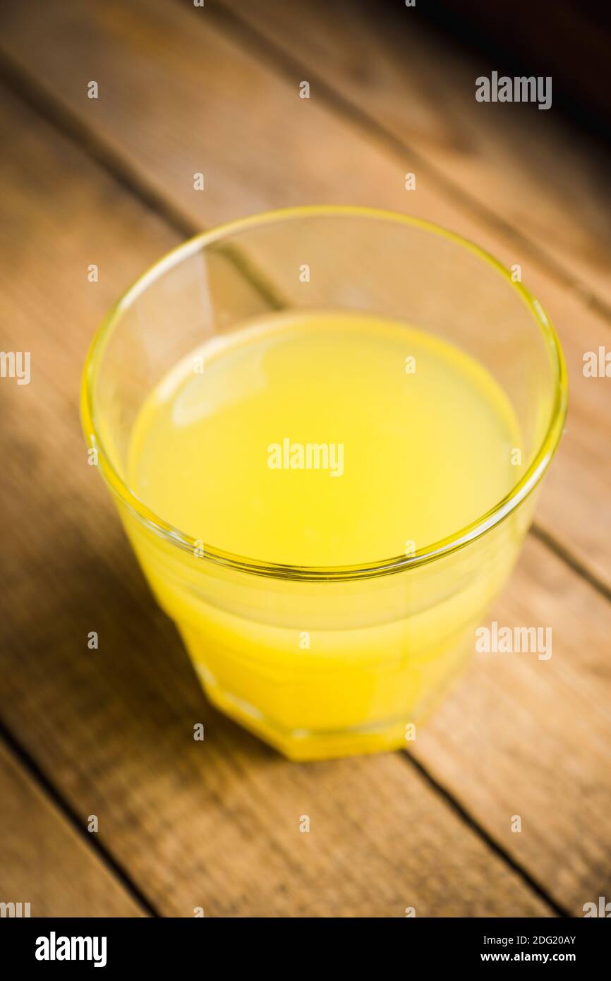 Old fashioned citrus beverage with spices. Selective focus. Shallow ...