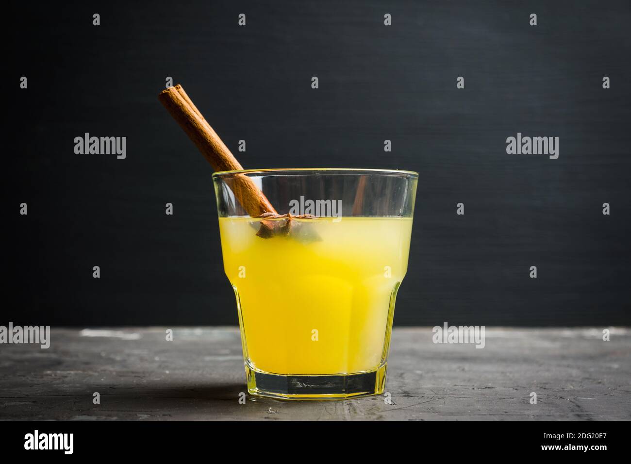 Old fashioned citrus beverage with spices. Selective focus. Shallow ...