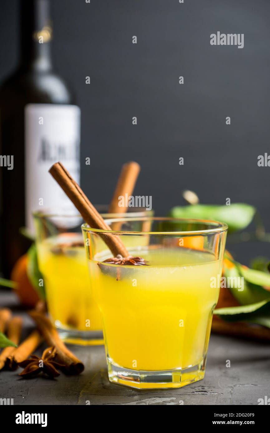 Old fashioned citrus beverage with spices. Selective focus. Shallow ...