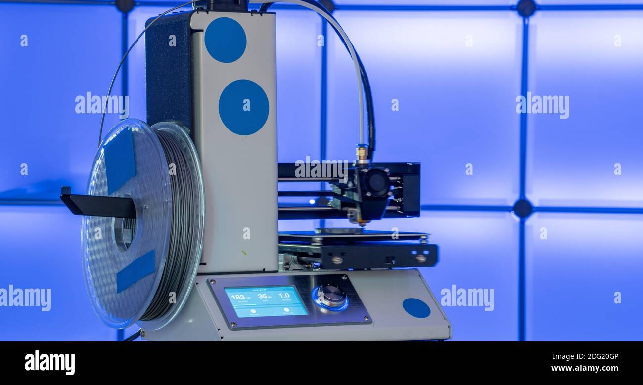 3D printer at work with printer 3D model High quality photo Stock Photo ...