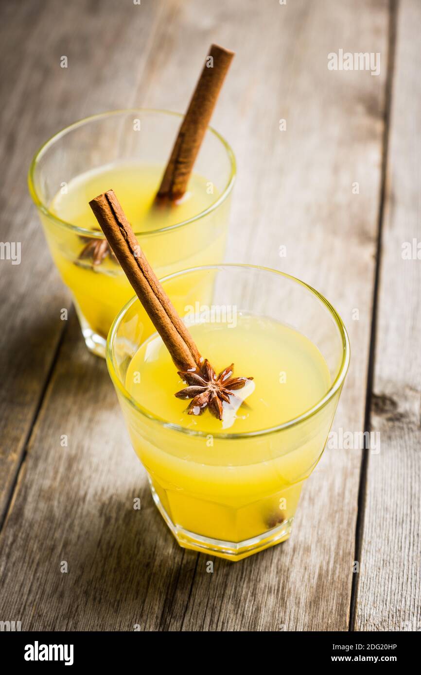 Old fashioned citrus beverage with spices. Selective focus. Shallow ...