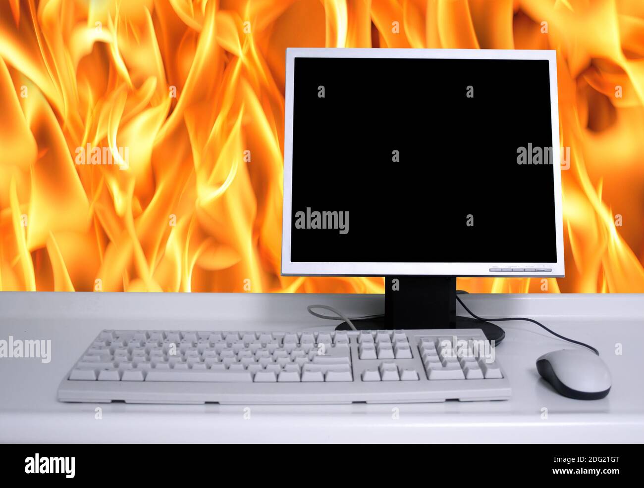 PC with black desktop and fire flames background Stock Photo - Alamy