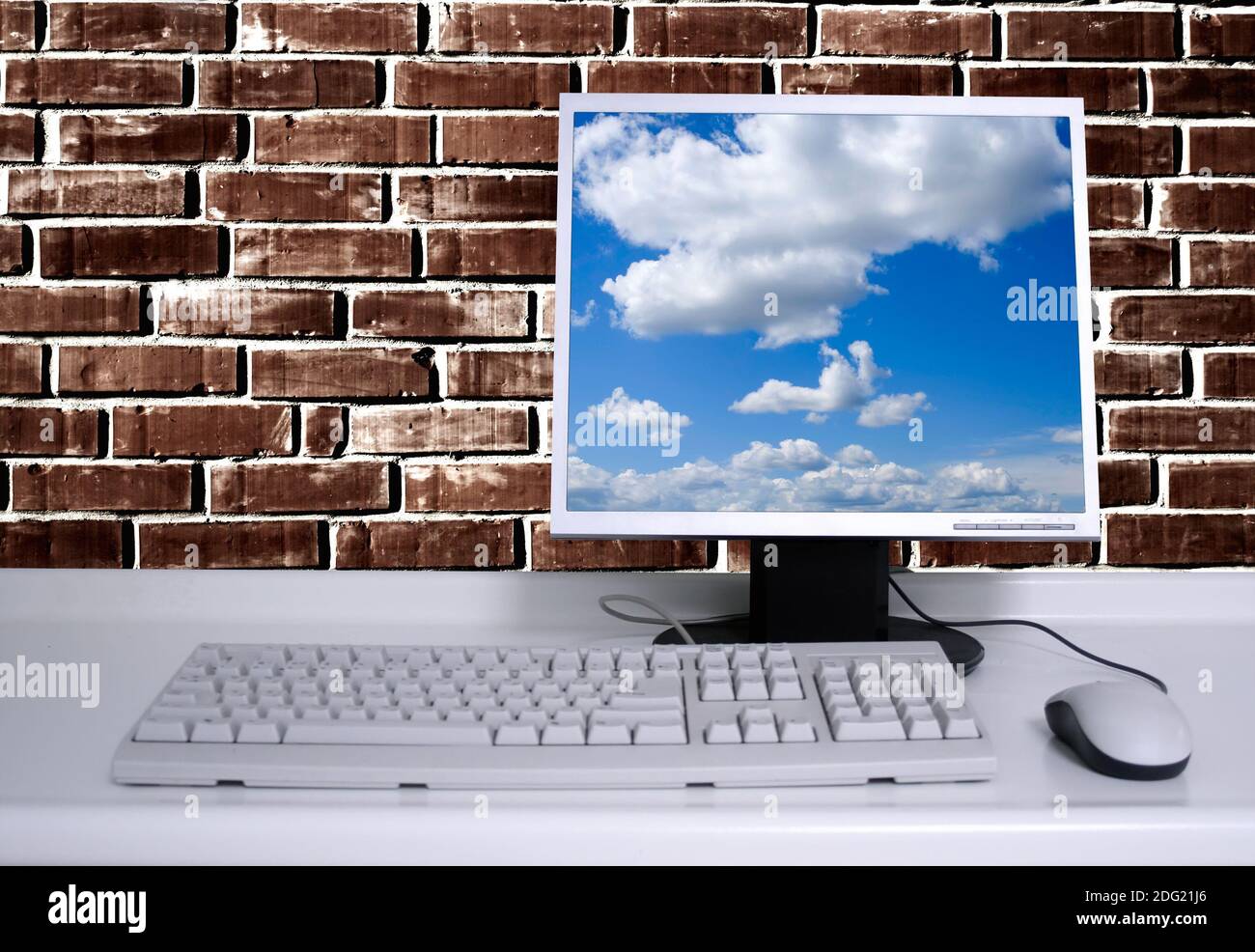 PC with black desktop and brick wall background and sky desktop Stock ...