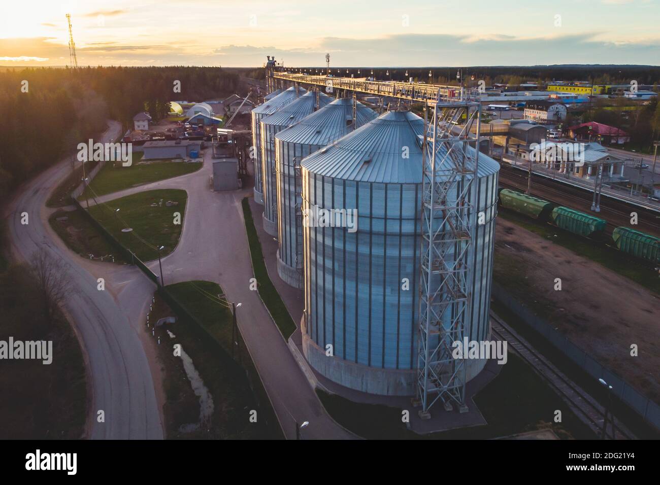 Aerial top view of Grain Elevator Silos, Granary of a feed mill built of modern metal structures ...