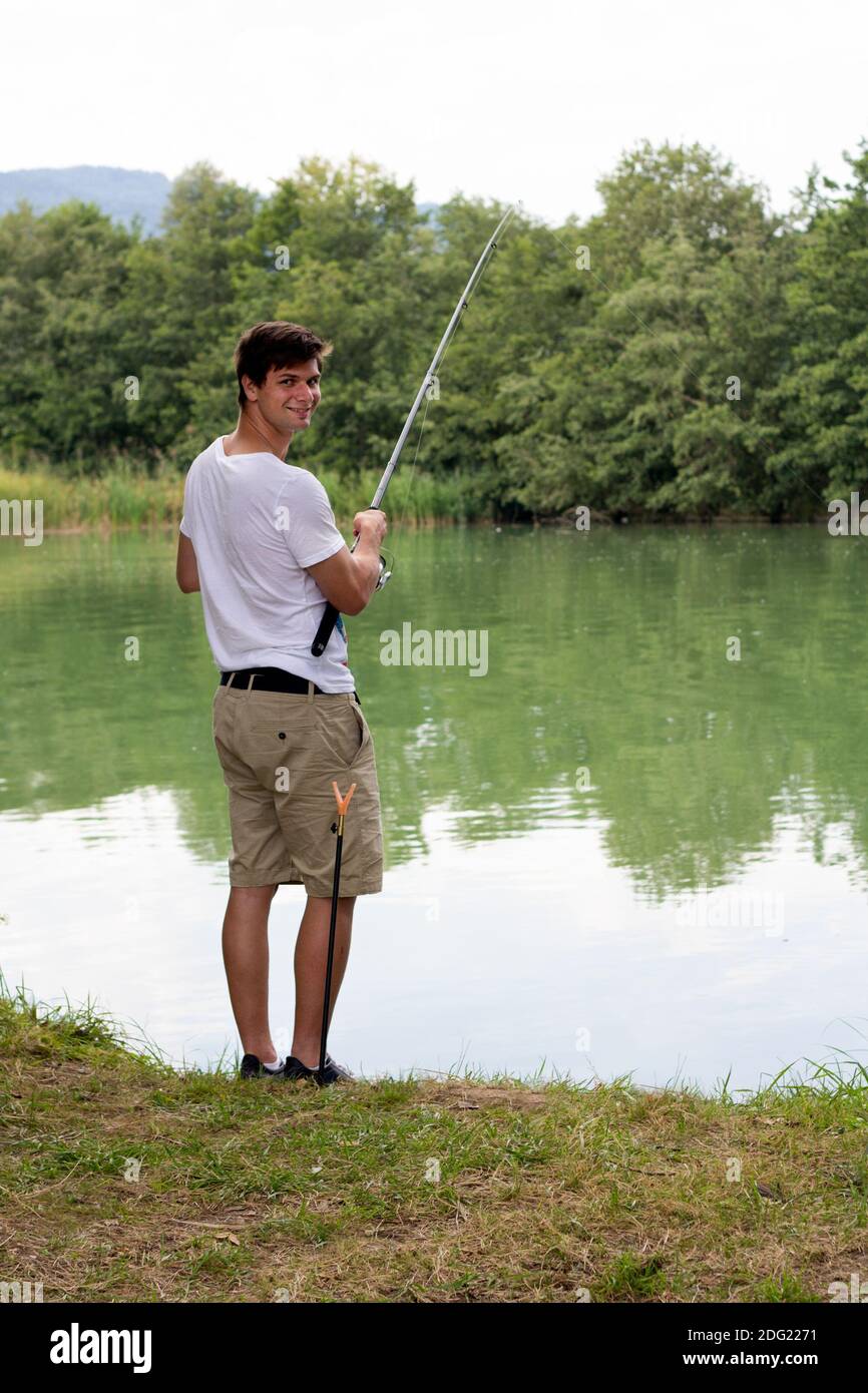 Person looking at lake fish hi-res stock photography and images - Alamy