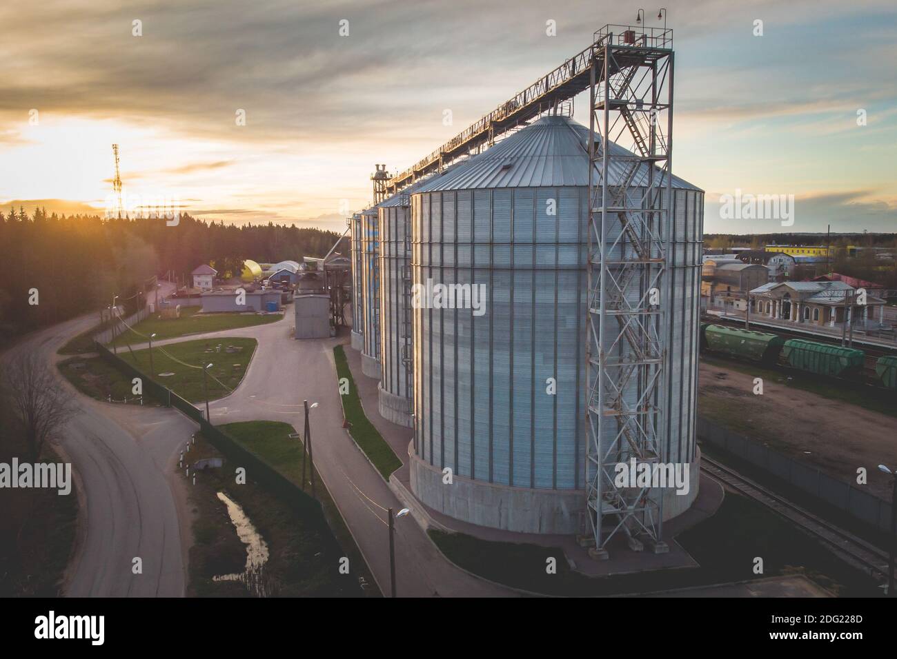 Aerial top view of Grain Elevator Silos, Granary of a feed mill built of modern metal structures ...