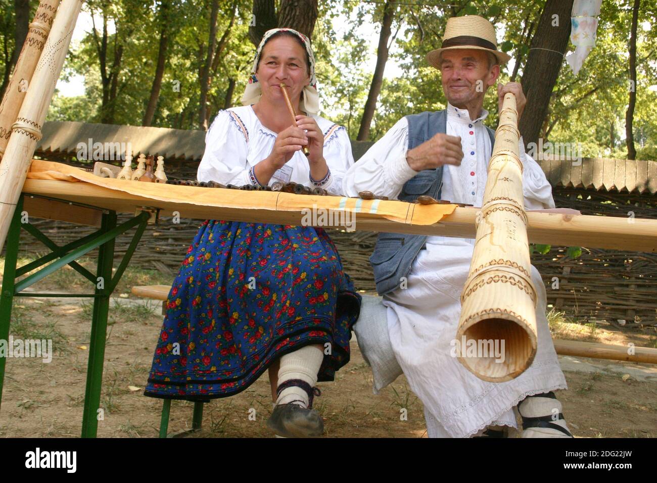 Romanian couple from Maramures selling various hand-made wind ...