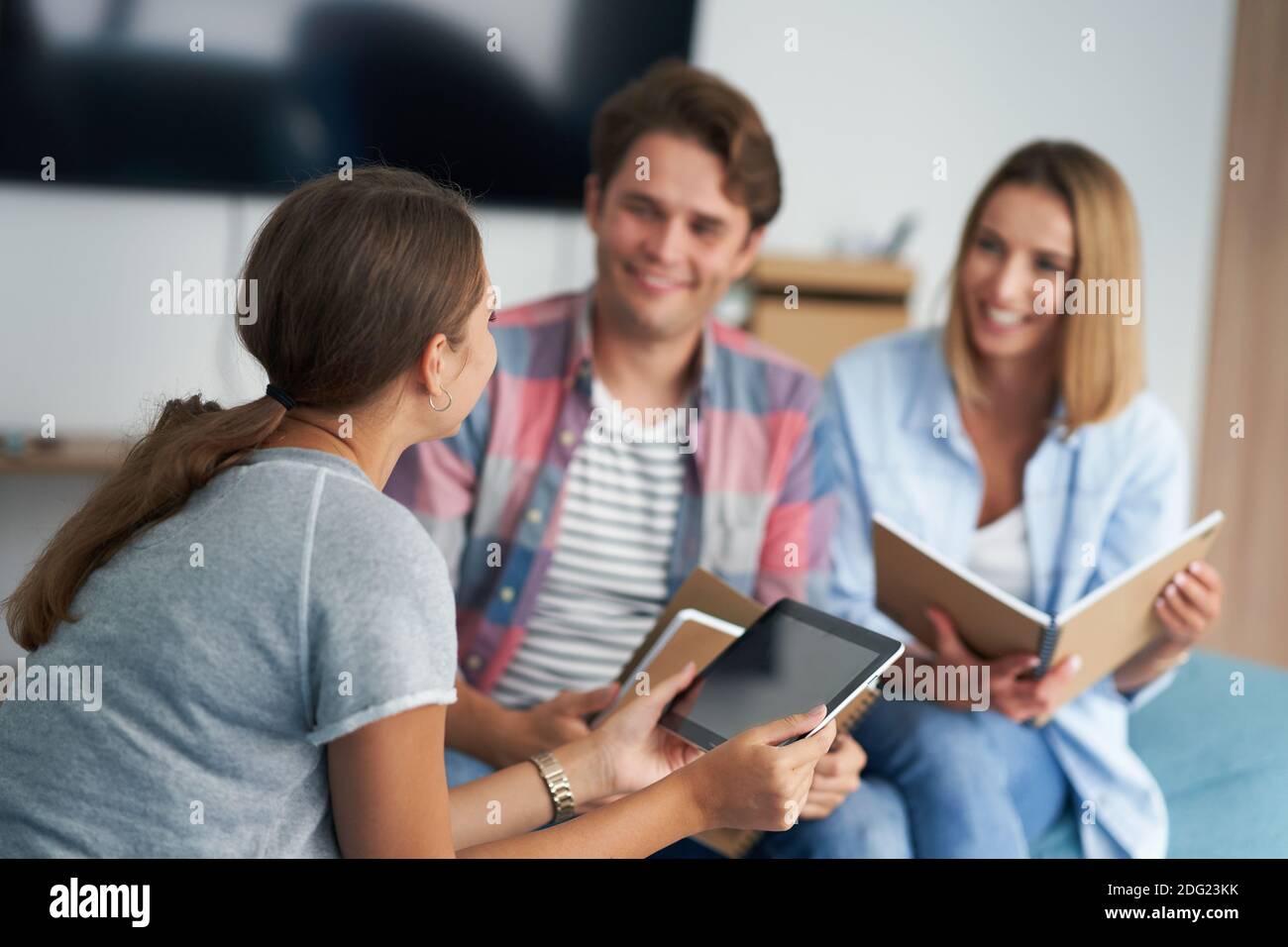 Group of students studying together in the campus Stock Photo - Alamy