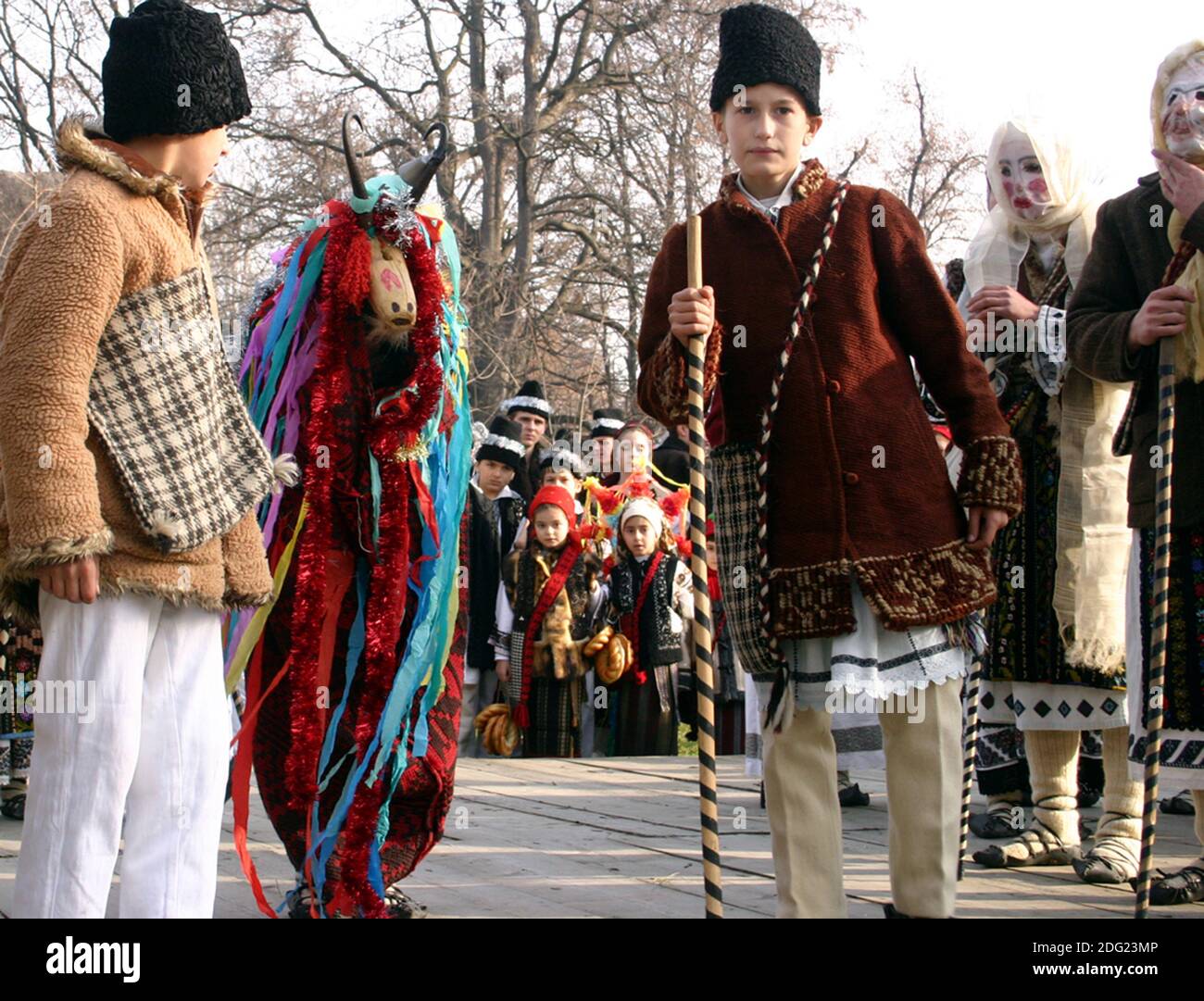 Young boys in Romania caroling with "Capra" (The Goat), wishing people ...