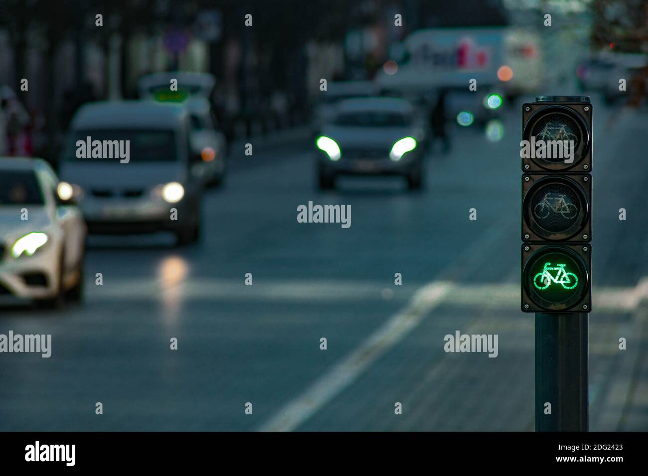 Sustainable transport. Bicycle traffic signal, green light, road bike ...