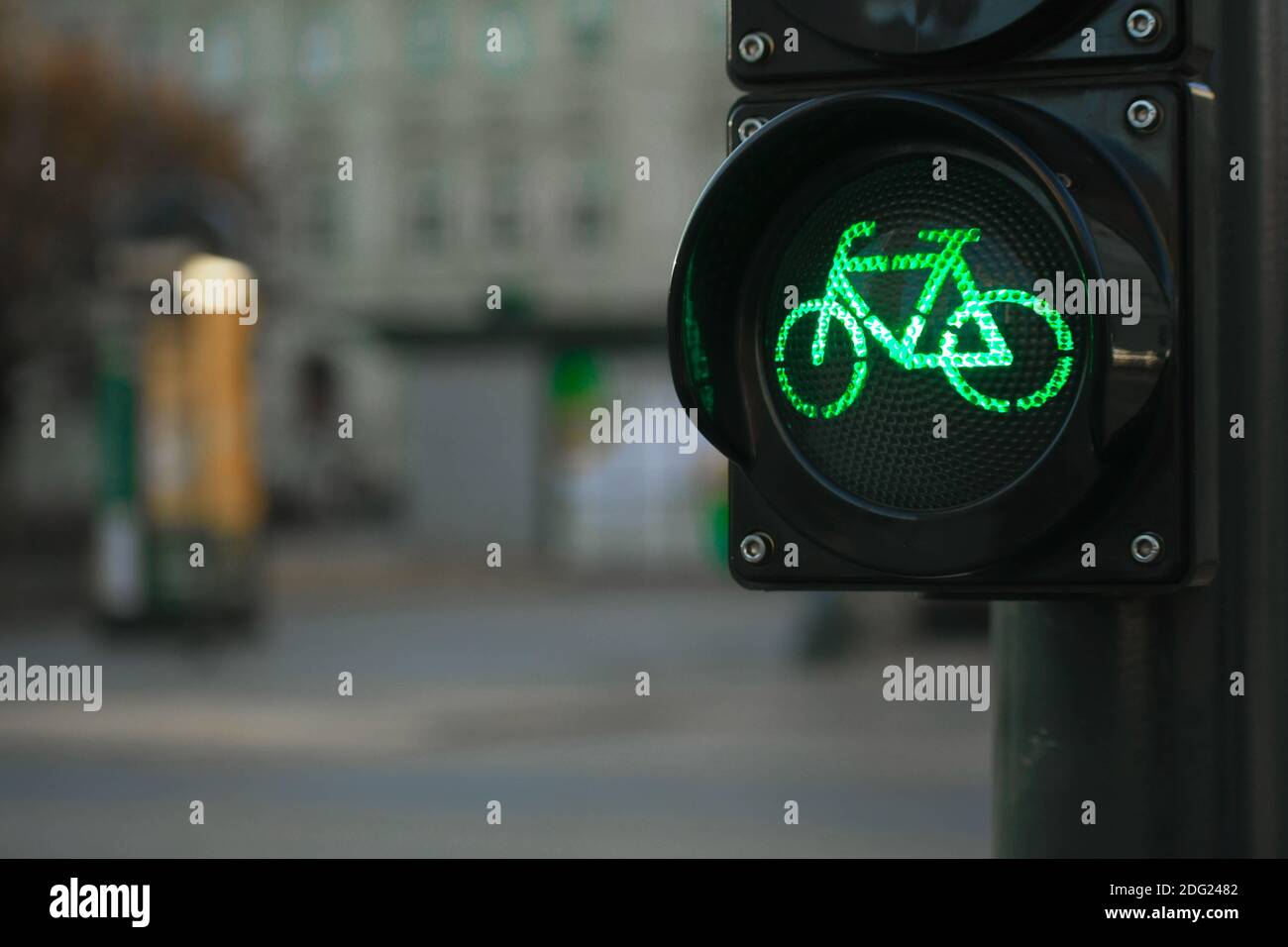 Sustainable transport. Bicycle traffic signal, green light, road bike ...