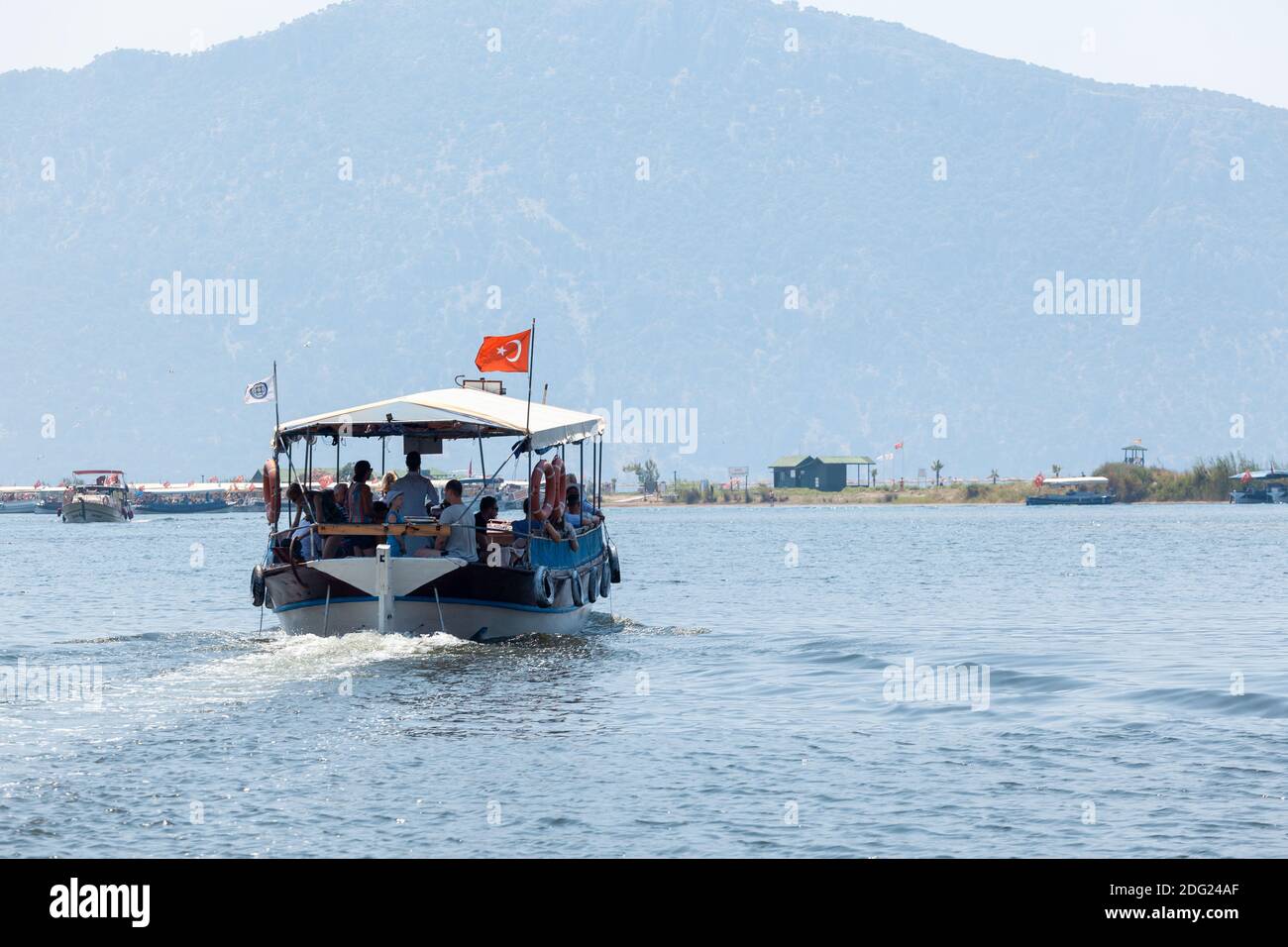 Boats with tourists floating on the river against the background of ...