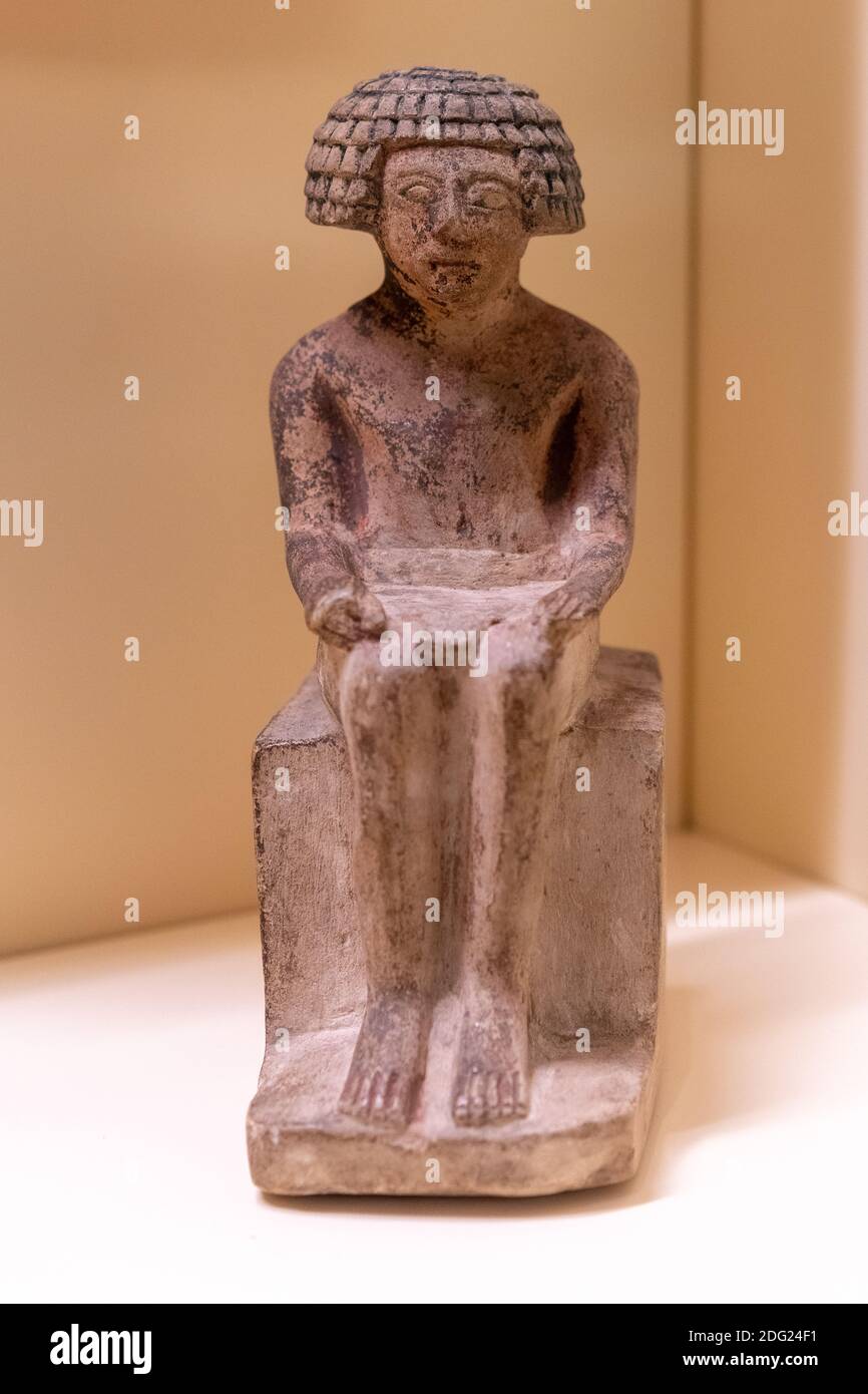 Tomb figure sculpted in stone. The item is seen in the Royal Ontario ...