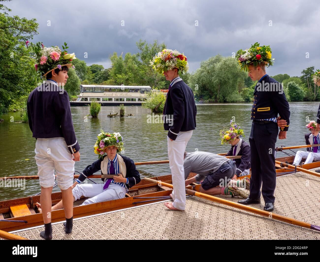 Eton 4 June Founders Day celebrations. Boys boat on river. Wearing ...