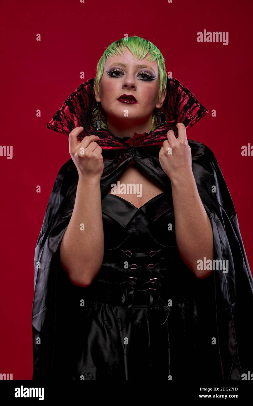 Woman dressed in gothic clothes, scary halloween Stock Photo - Alamy