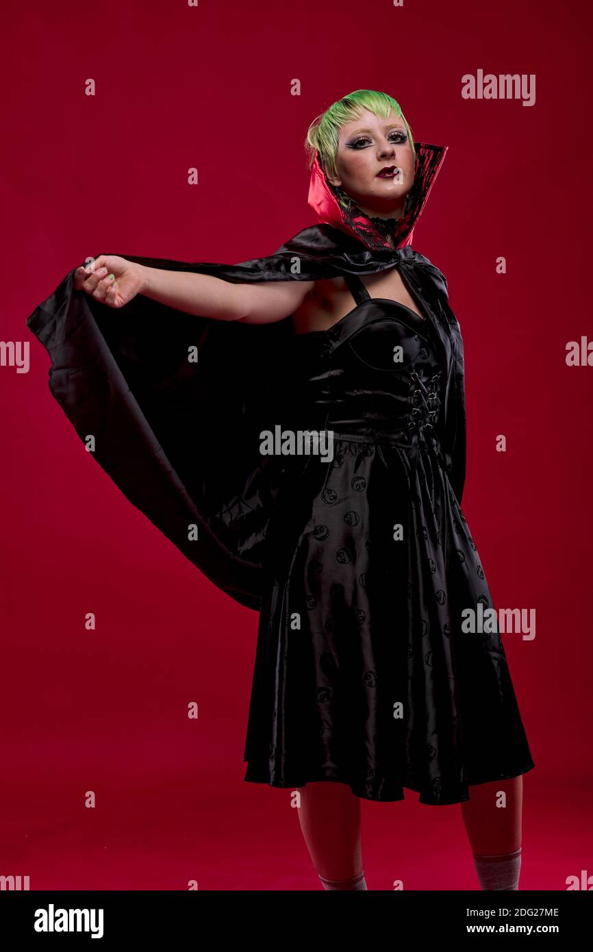 Woman dressed in gothic clothes, scary halloween Stock Photo - Alamy