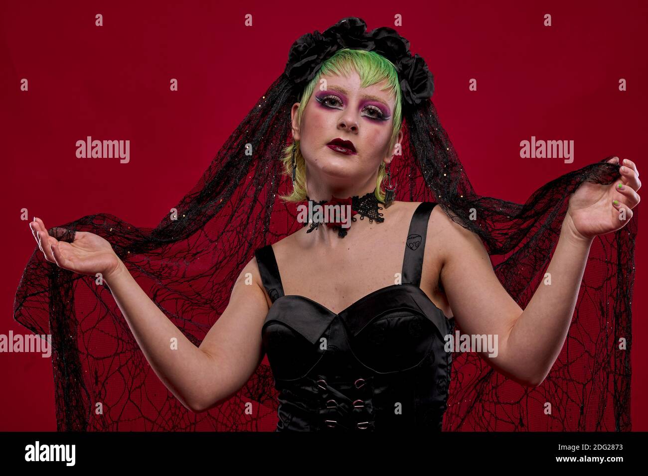 Woman dressed in gothic clothes, scary halloween Stock Photo - Alamy