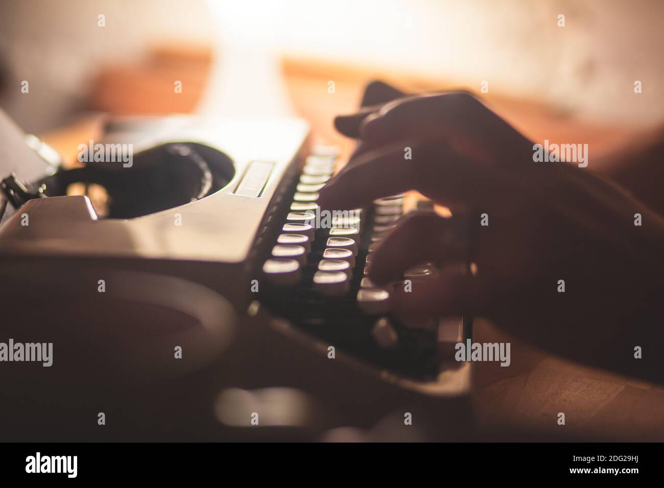 Process of writing a text letter on a white sheet of paper with old ...