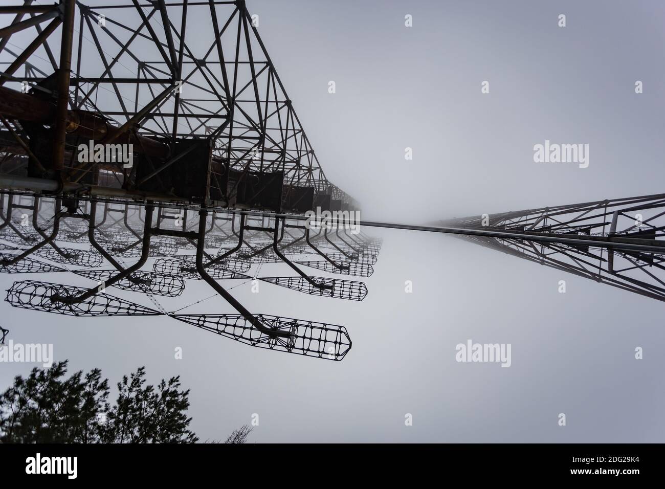 Soviet radar Duga in foggy weather. Russian woodpecker - over-the ...