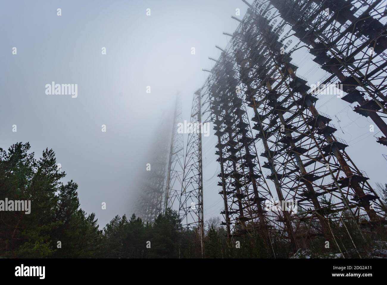 Soviet radar Duga in foggy weather. Russian woodpecker - over-the ...