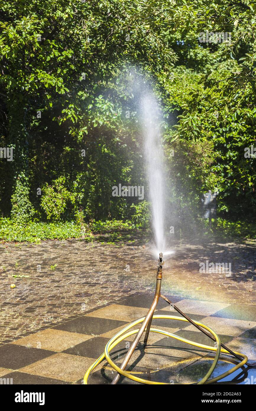 Lawn sprinklers hi-res stock photography and images - Alamy