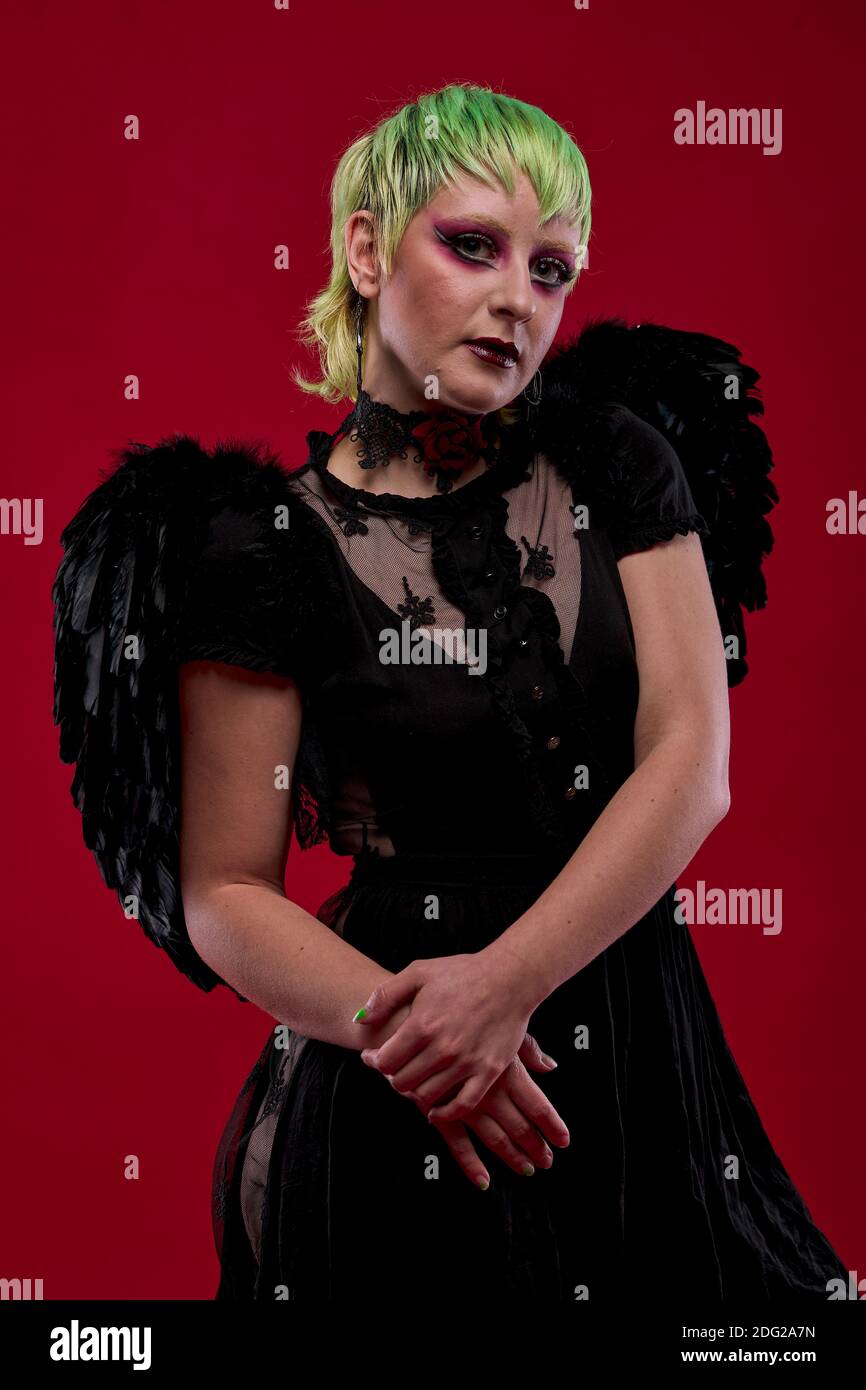 Woman dressed in gothic clothes, scary halloween Stock Photo - Alamy