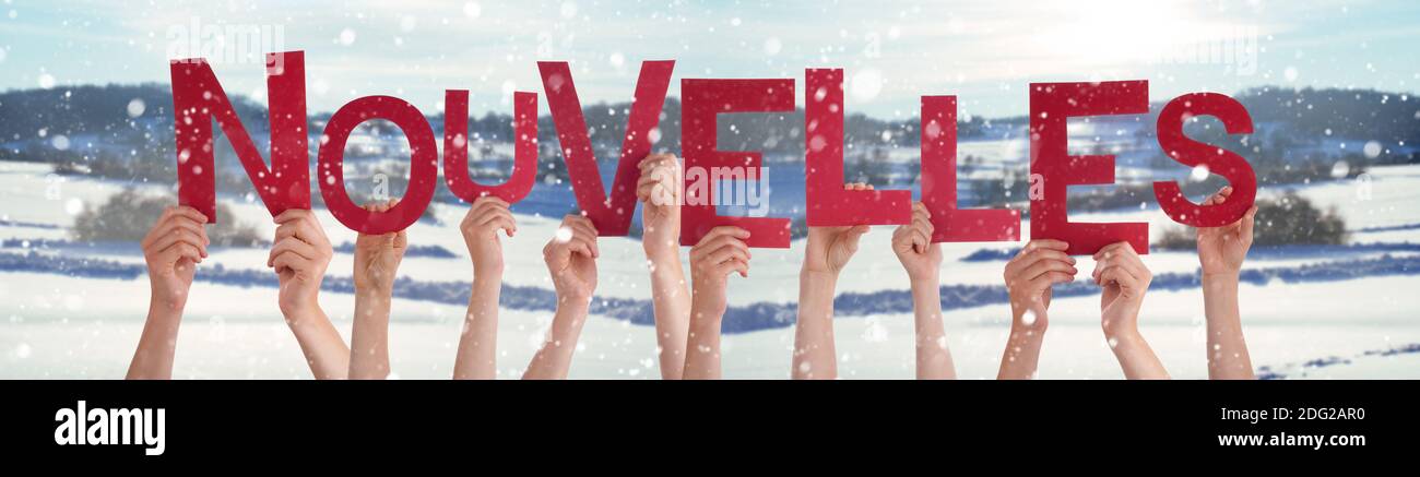People Hands Holding Word Nouvelles Means News, Snowy Winter Background ...