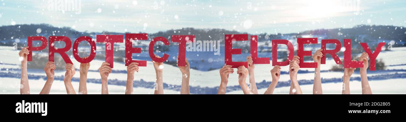 People Hands Holding Word Protect Elderly, Snowy Winter Background ...