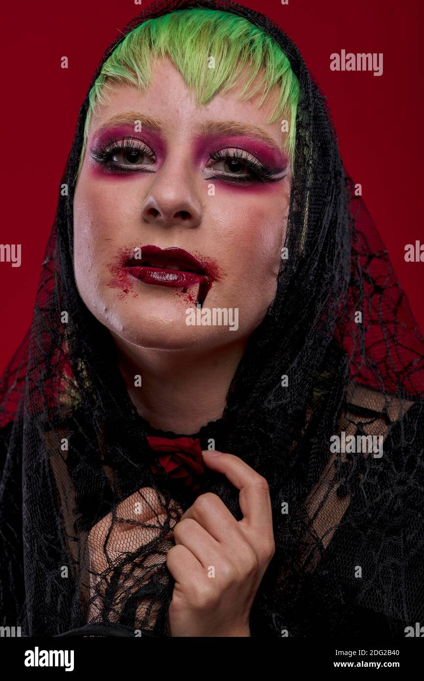 Woman dressed in gothic clothes, scary halloween Stock Photo - Alamy
