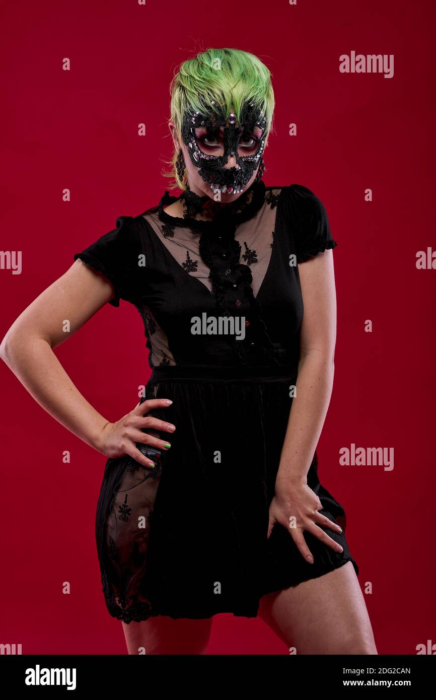 Woman dressed in gothic clothes, scary halloween Stock Photo - Alamy