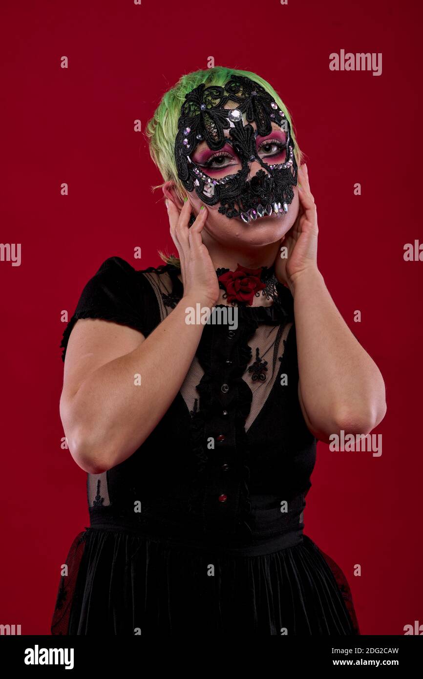 Woman dressed in gothic clothes, scary halloween Stock Photo - Alamy