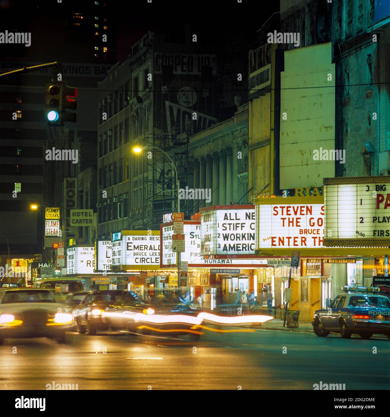 New York 1985, 42nd street at night, moving cars traffic, motion effect ...