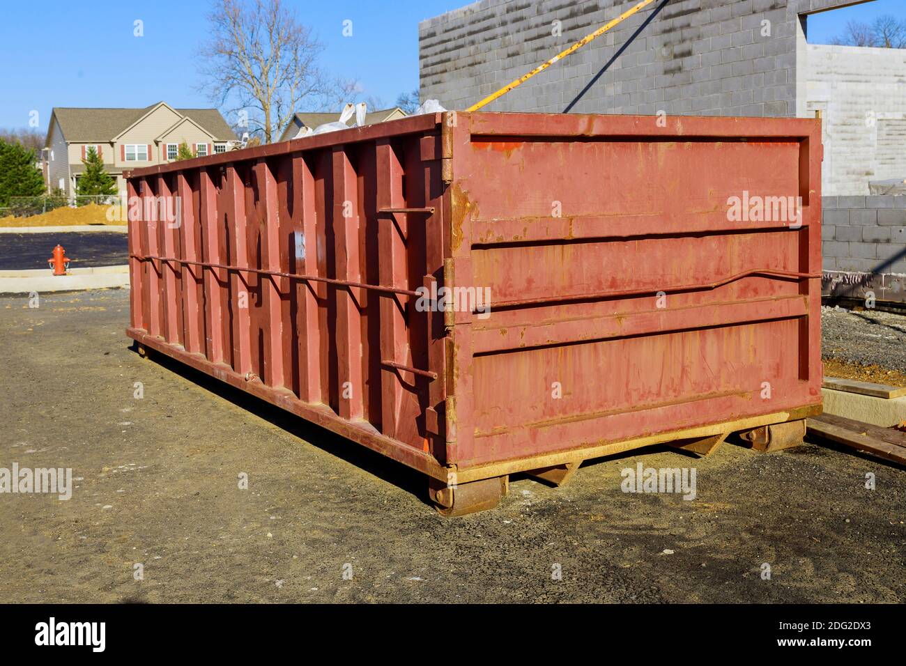 Construction trash garbage dumpsters on metal container house ...