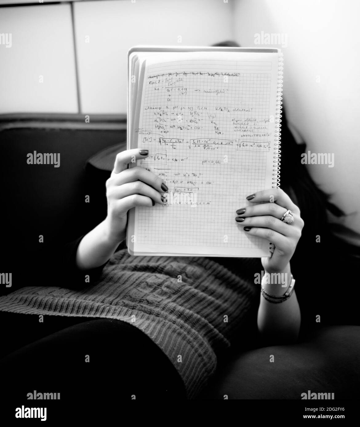 Female reading book at home sofa Black and White Stock Photos & Images ...