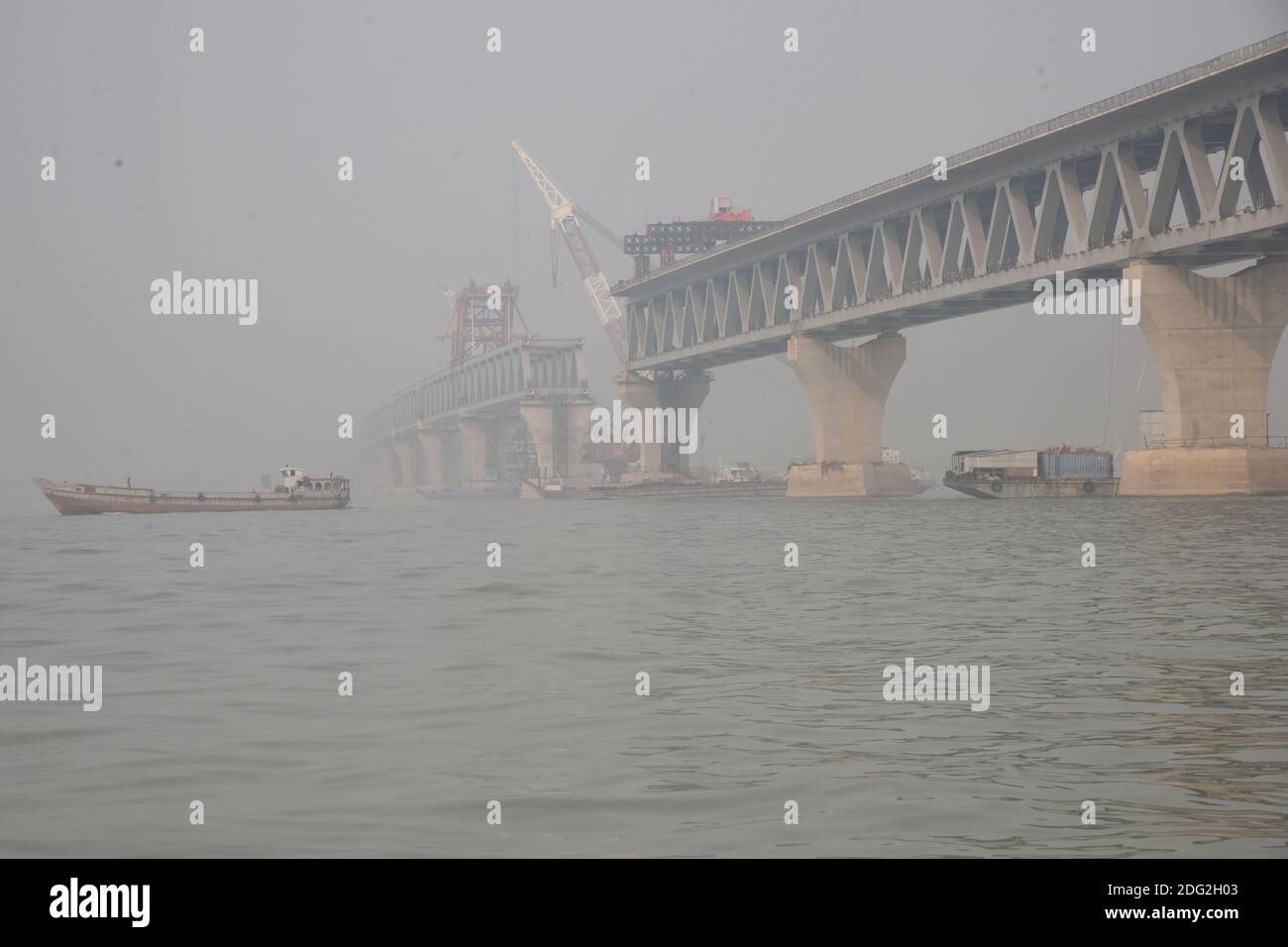 A view of under construction Padma Bridge over the Padma River near ...