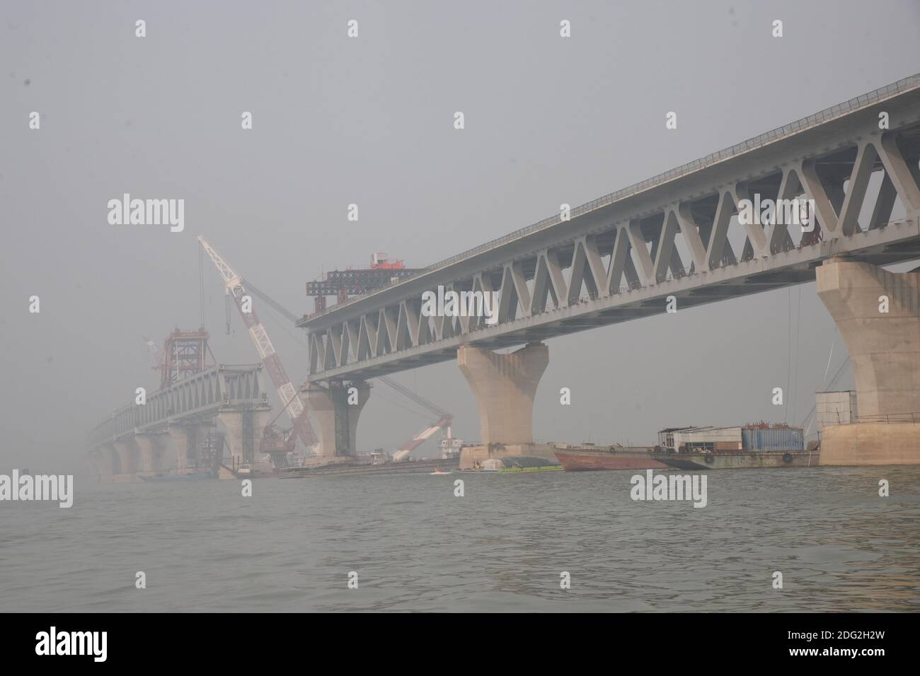 A view of under construction Padma Bridge over the Padma River near ...