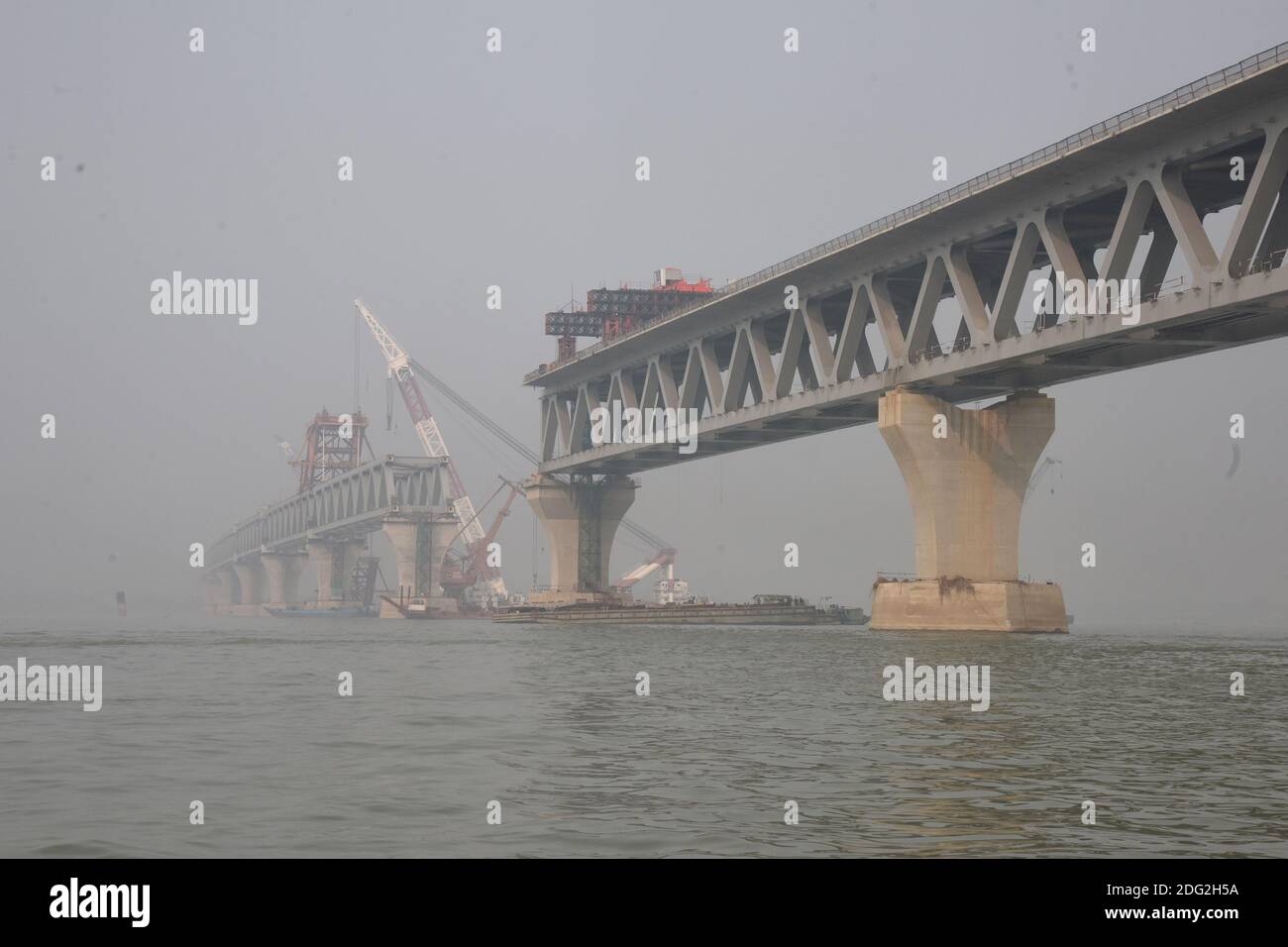 A view of under construction Padma Bridge over the Padma River near ...