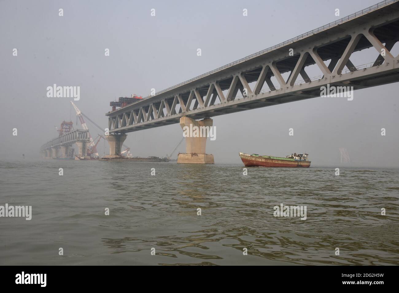 A view of under construction Padma Bridge over the Padma River near ...