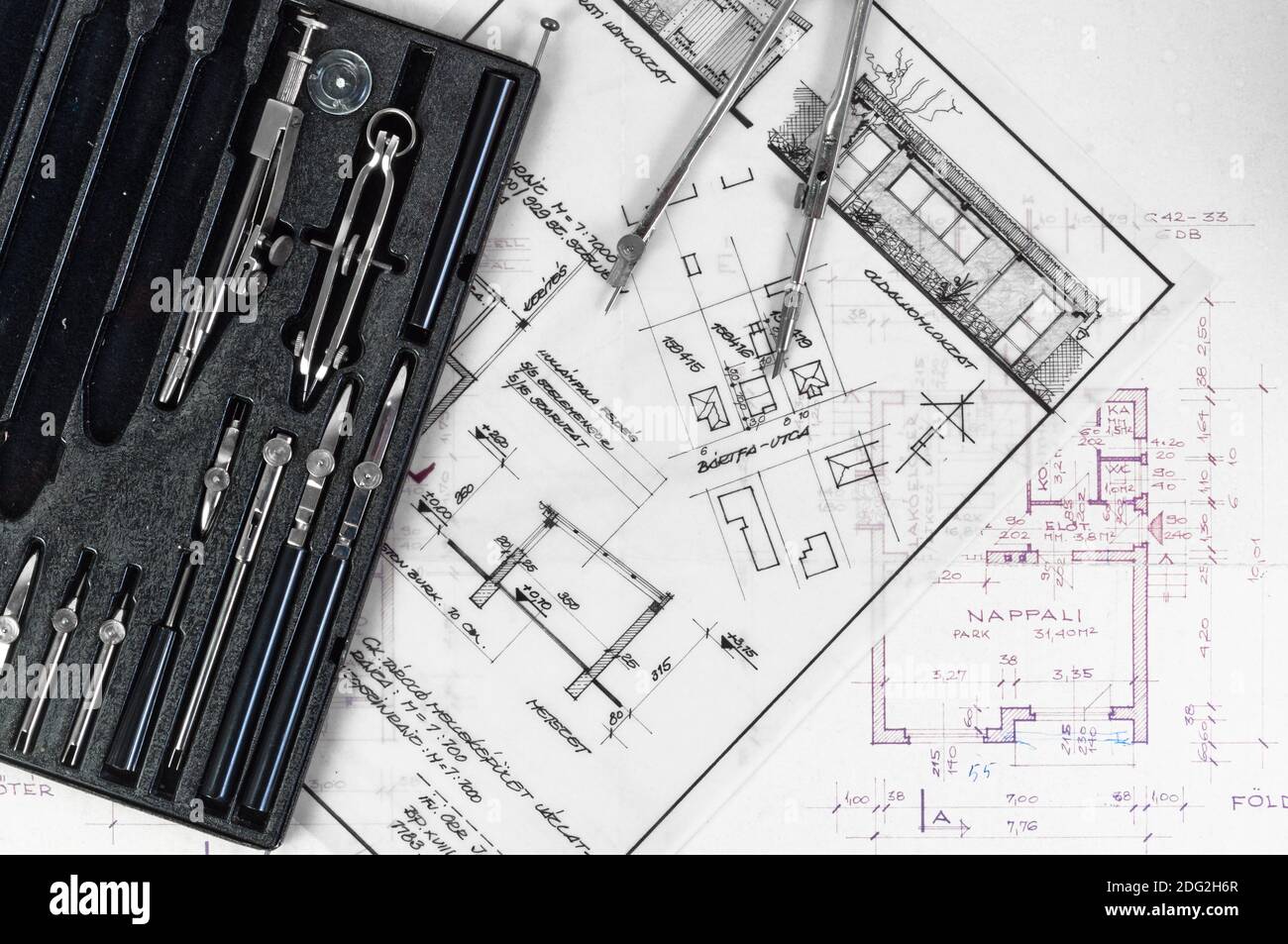 Construction plans with accessories Stock Photo - Alamy