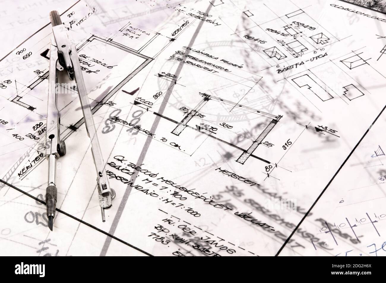 Business background made out of construction plans Stock Photo - Alamy