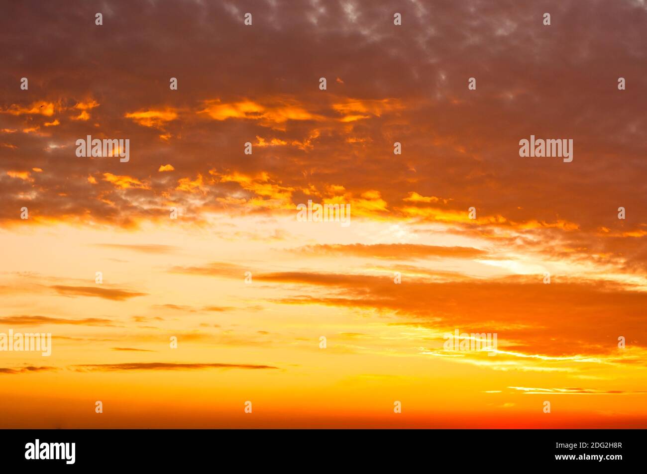 Orange sunset with clouds hi-res stock photography and images - Alamy