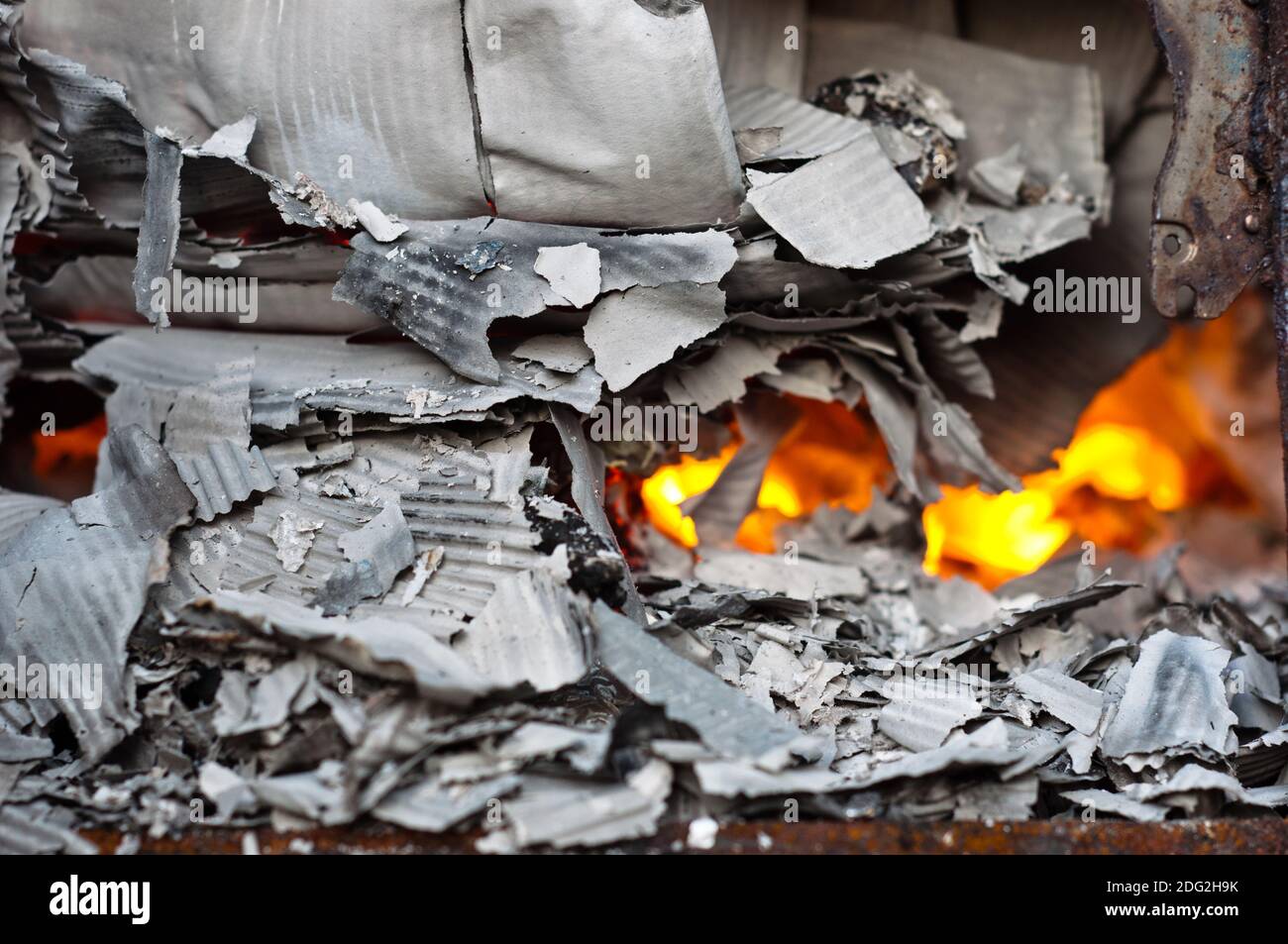 Flame burning in barrel with papers Stock Photo - Alamy