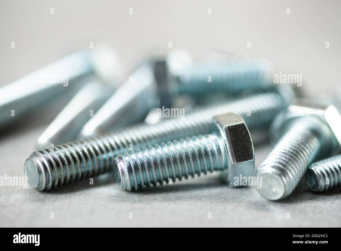 The metal bolts are covered. Chrome plated screw bolts Stock Photo - Alamy