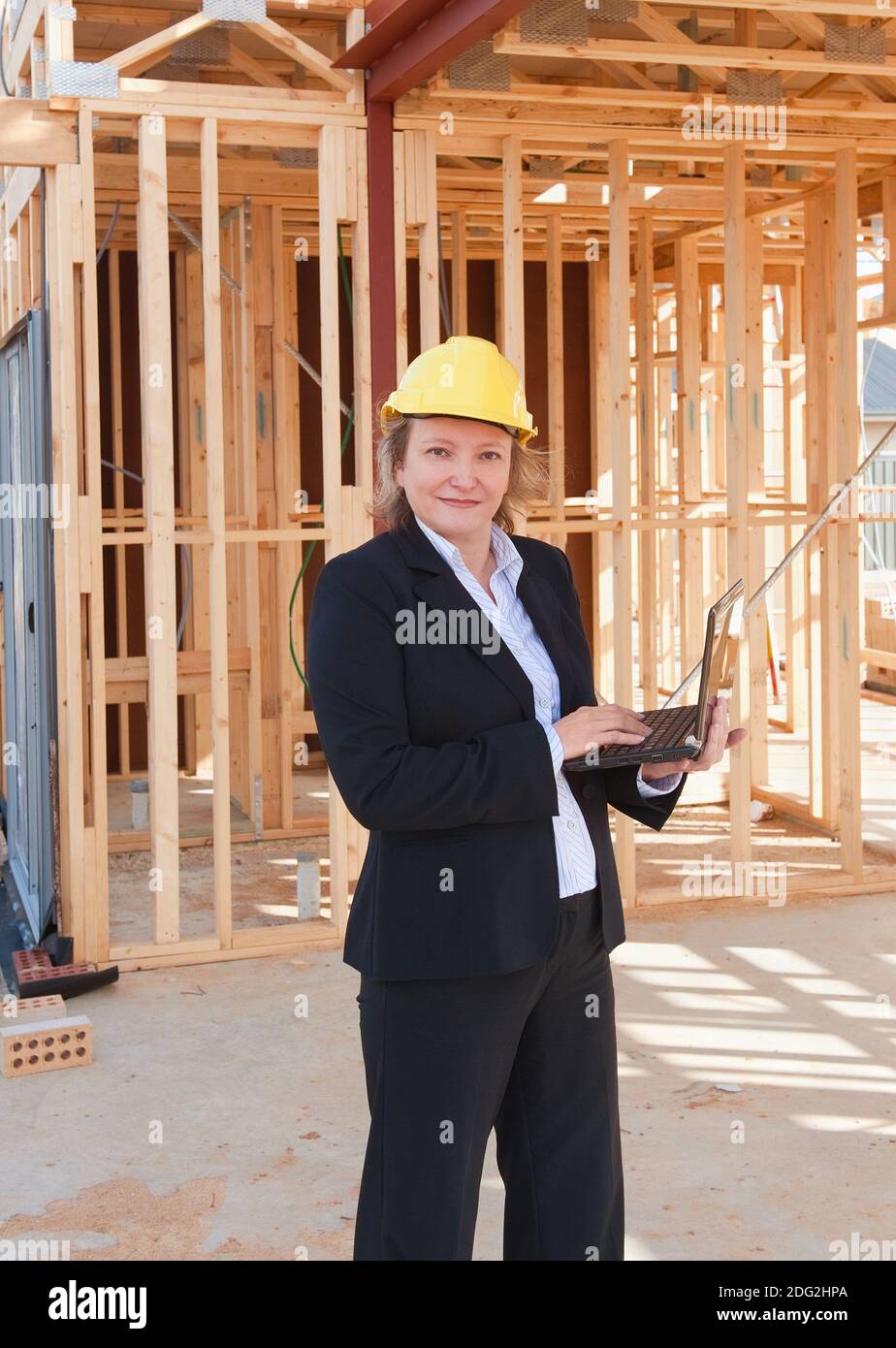 Woman constructor helmet construction hi-res stock photography and ...