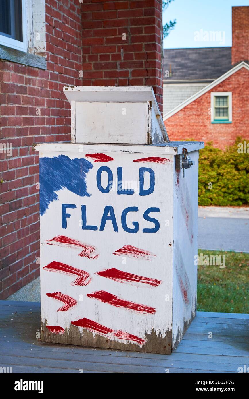An old flag collection box at the local Americon Legion Post, #85. In ...