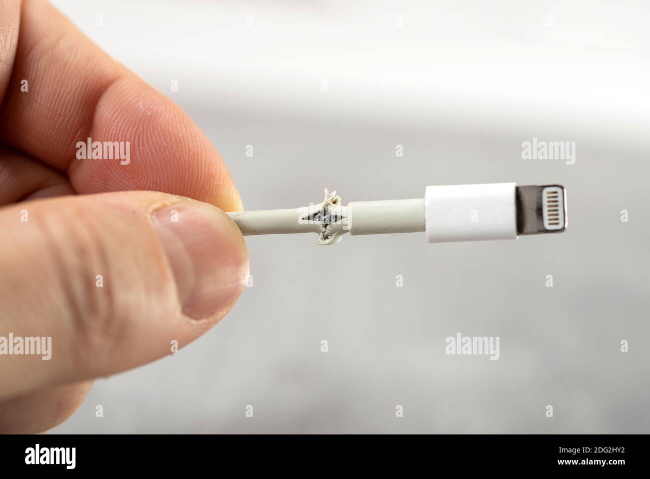 Broken phone charger cable hi-res stock photography and images - Alamy