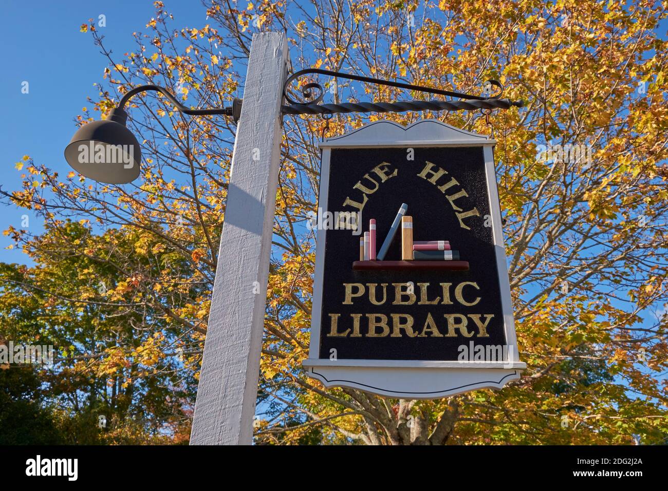 The ols style, painted, hanging sign for the Blue Hill Library. In Blue ...