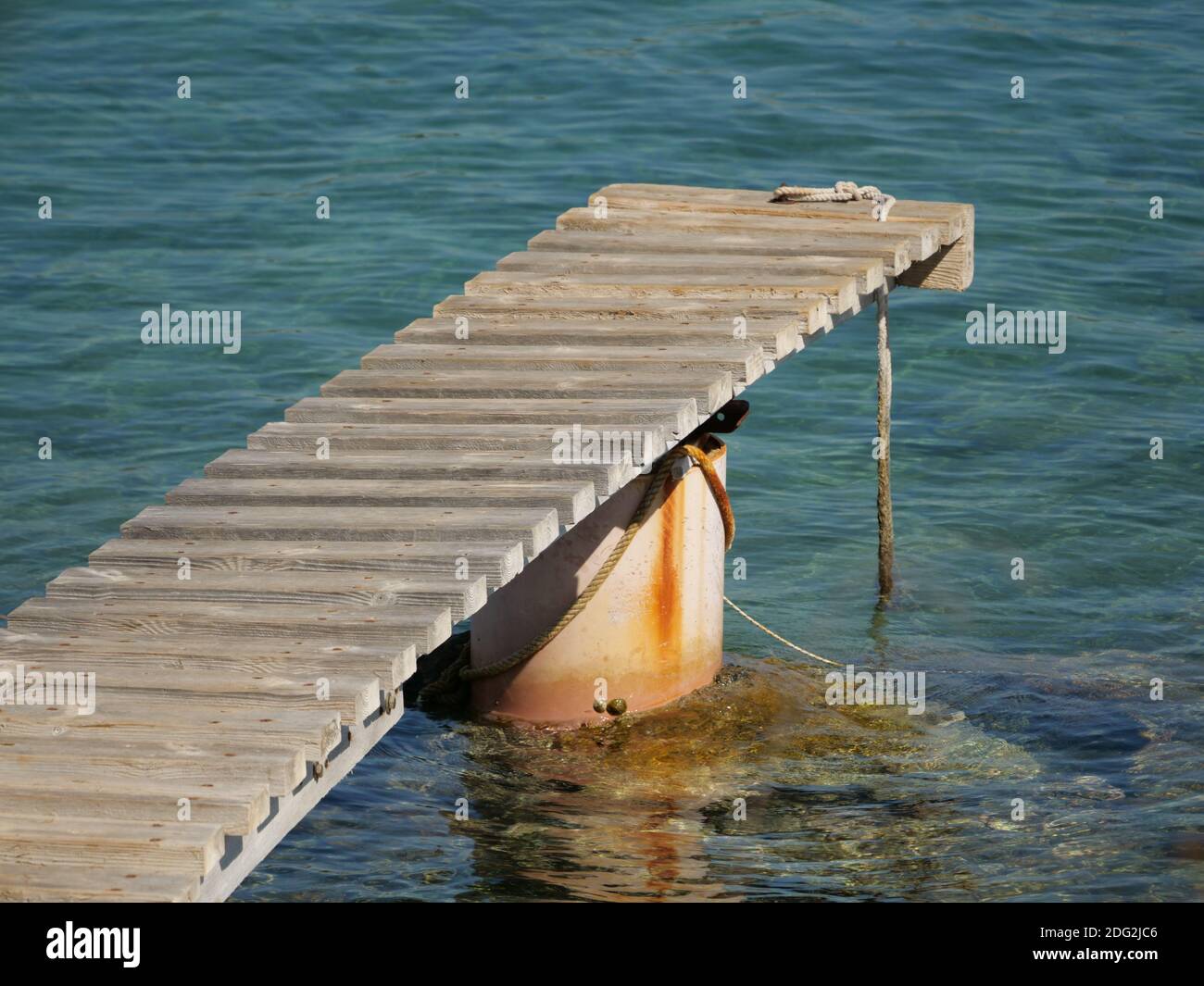 A wooden old dock leading to the sea Stock Photo - Alamy