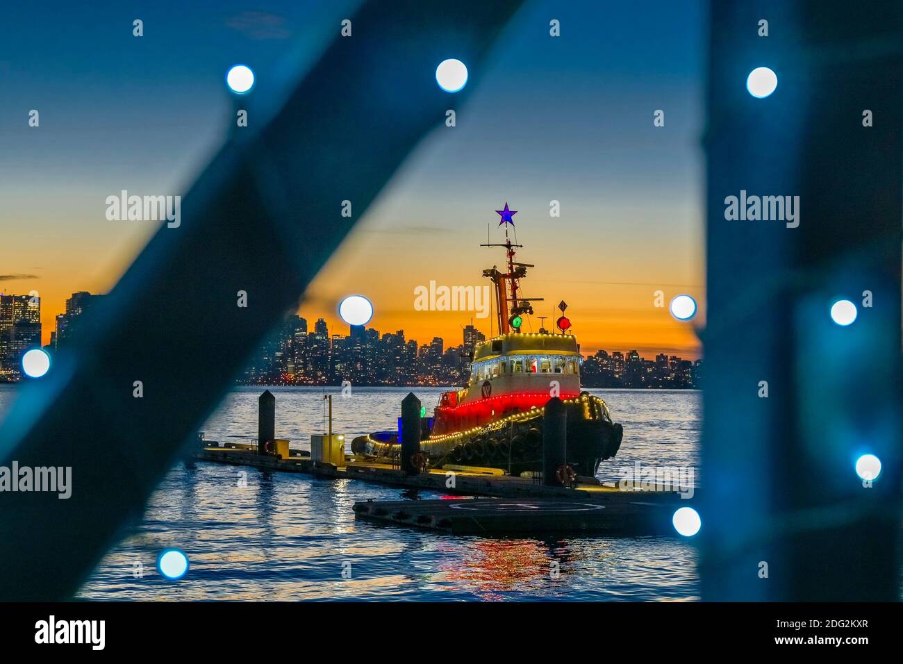 North Star tugboat, decked with holiday lights, Shipyards, Lonsdale Quay, North Vancouver ...